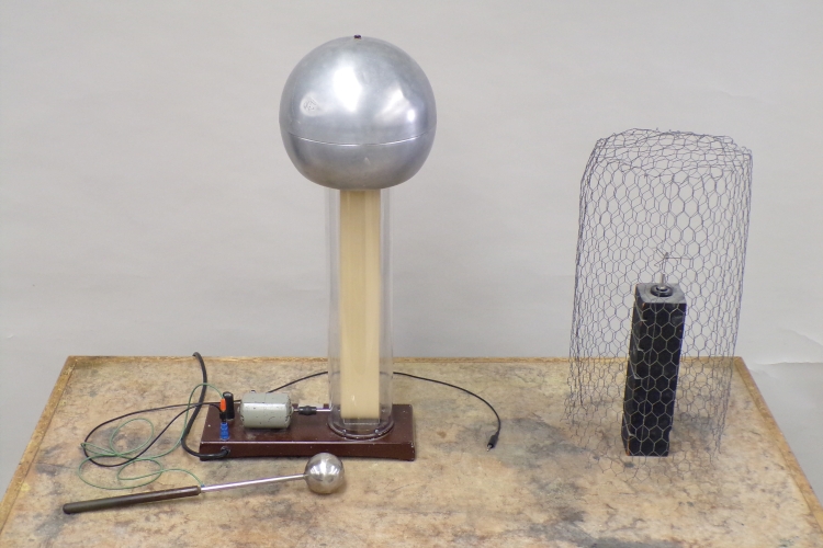 56.39 -- Electrostatic pinwheel in cage