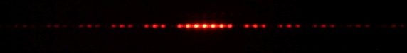 84.06 -- Laser beam diffracted through various slits