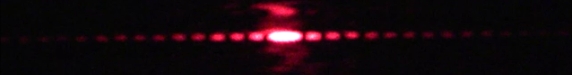 84.06 -- Laser beam diffracted through various slits