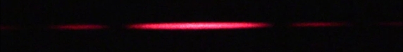 84.06 -- Laser beam diffracted through various slits