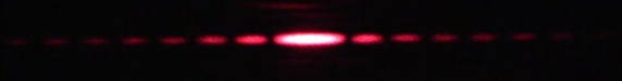 84.06 -- Laser beam diffracted through various slits